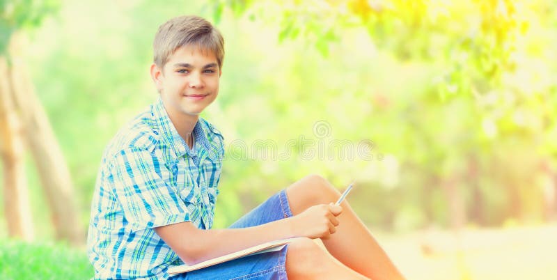 Teen boy with notebooks stock photo. Image of book, laying - 43991428