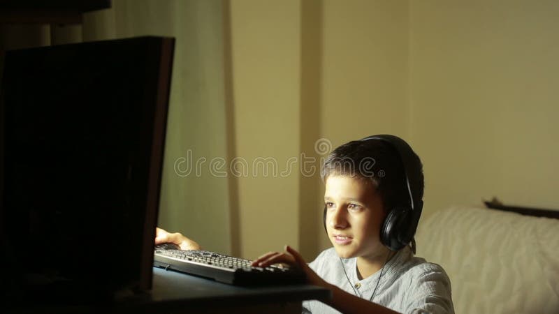 Teen Boy Plays Games on the Computer at Night. Online Games Stock Video ...
