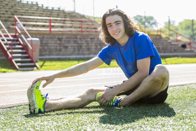 Teen Boy Ready To Run Outside on a Training Field Stock Photo - Image ...