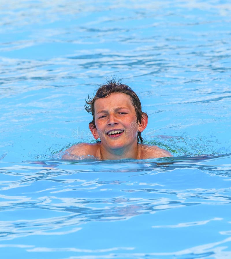 Teen Boy Swimming in the Pool Stock Image - Image of playing, portrait ...