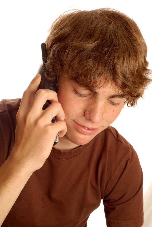 Teen boy talking on phone stock image. Image of cordless - 5611921