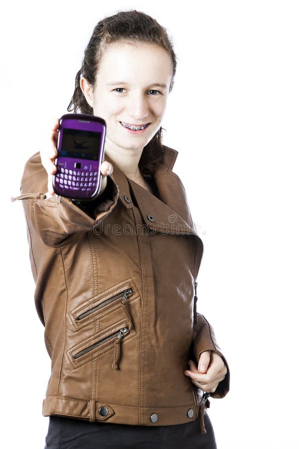 Teen with cellphone stock photo. Image of girl, brown - 25505526