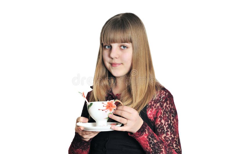 Teen girl drinking a tea stock photo. Image of closeup - 23464152