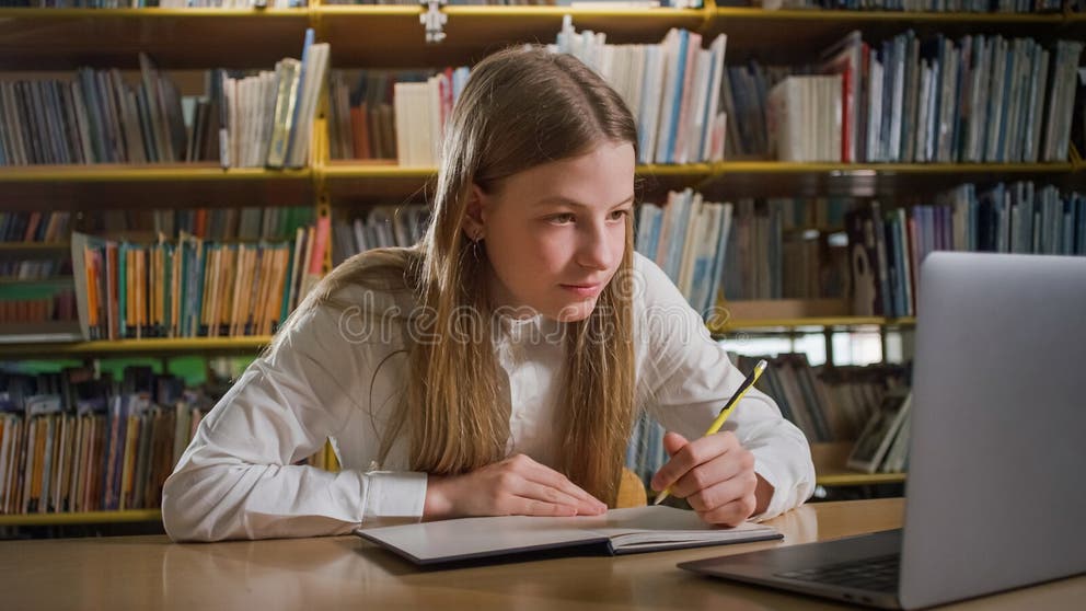 Teen Girl Learn in the Library, Thinking Over a School Assignment Stock ...