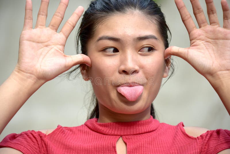 Teen Girl Making Funny Faces Stock Image - Image of silly, happy: 143797651