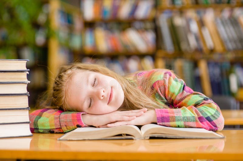 Teen girl sleep in library stock image. Image of girl - 72869613