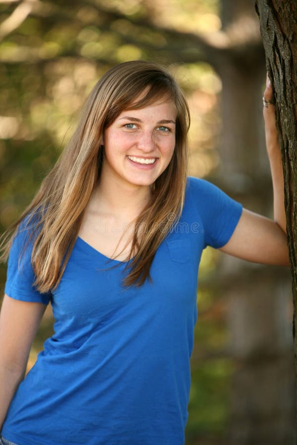 Teen girl by tree stock image. Image of outside, real - 12026583