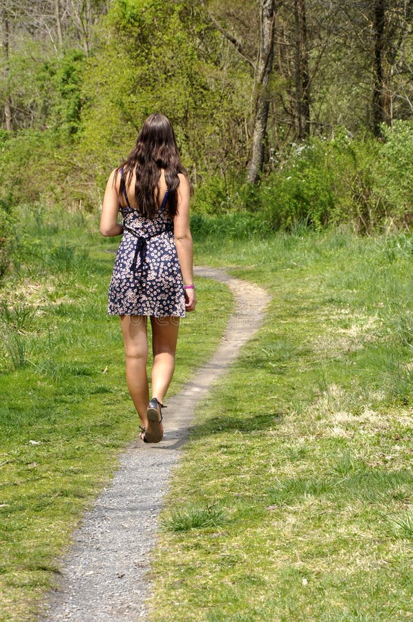 Teen Girl Walking On A Path Stock Image - Image: 13824241