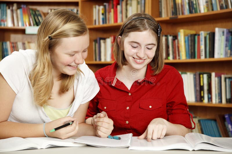 Teen Girls - Homework Fun stock image. Image of books - 18367843