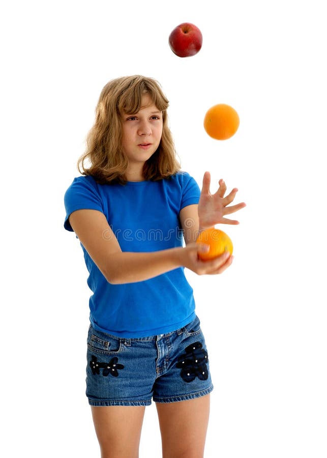 Teen Juggling Apple and Orange 3 Stock Photo - Image of comparison ...