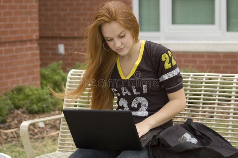 Teen on laptop stock photo. Image of teen, learning, outside - 6803886
