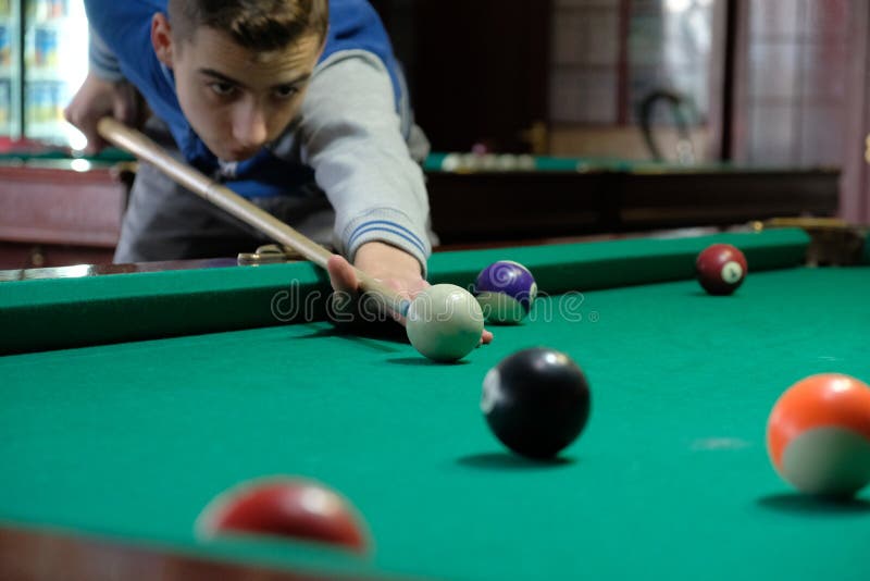 Teen Playing in American Pool Billiard. Stock Photo - Image of green ...