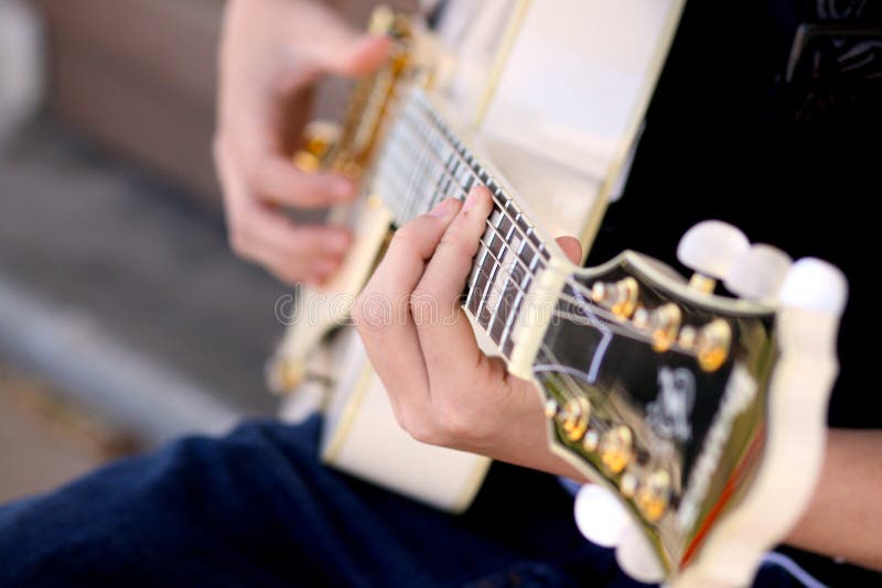 Teen playing a guitar stock photo. Image of teen, black - 9038802