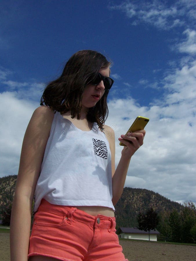 Teen reading text message stock photo. Image of people - 53560212