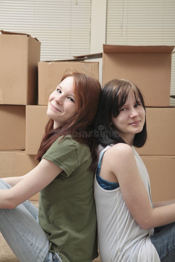 Teen sisters moving stock image. Image of rest, sisters - 14009739