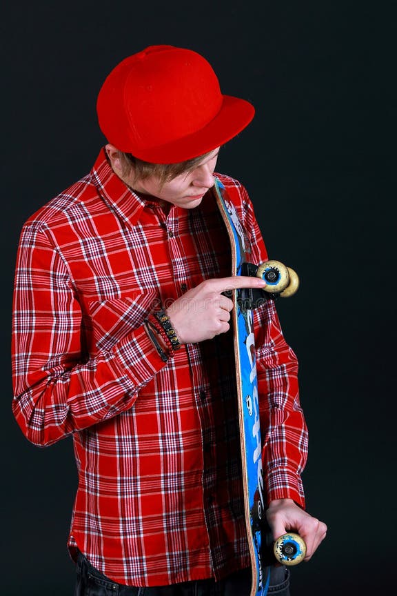 A teen with skateboard stock photo. Image of inspecting - 23100196