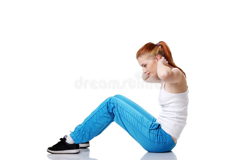 Teen Student Doing Exercises On The Floor. Stock Photo - Image of ...
