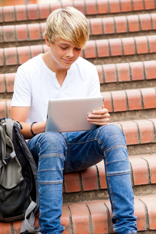Teen using tablet computer stock image. Image of teenager - 24778517
