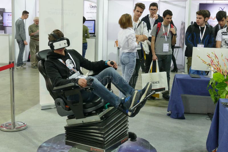 Teen Wearing Virtual Reality Device Testing Flight Simulator Editorial ...
