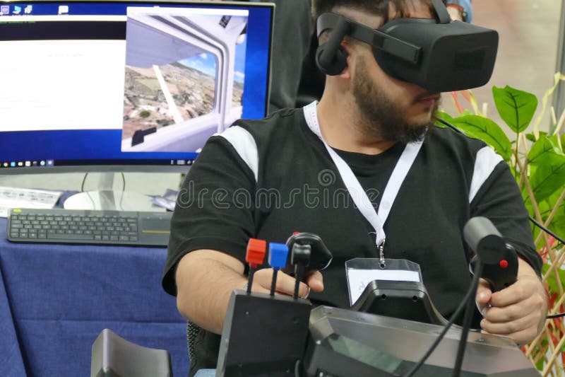 Teen Wearing Virtual Reality Device Testing Flight Simulator Editorial ...