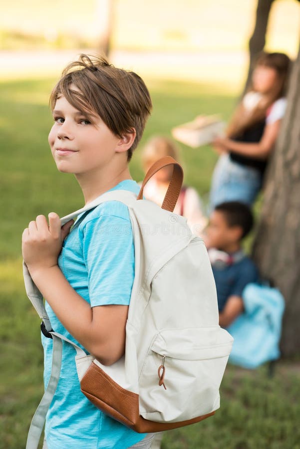 Teenage boy with backpack stock photo. Image of european - 100178336