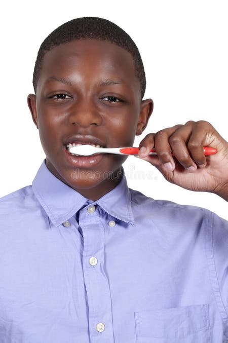 Teenage Boy Brushing Teeth stock photo. Image of diverse - 26764860