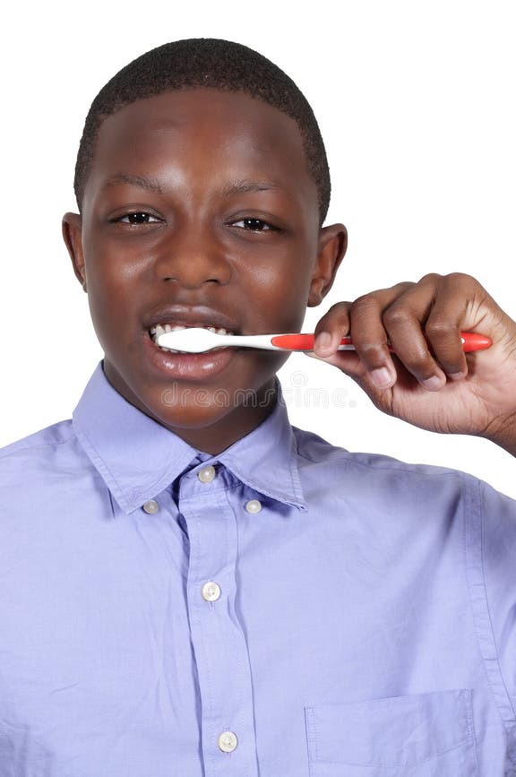Teenage Boy Brushing Teeth stock photo. Image of diverse - 26764860
