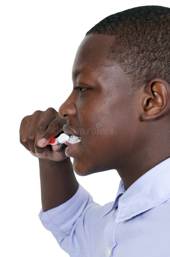 Teenage Boy Brushing Teeth stock photo. Image of care - 26764866