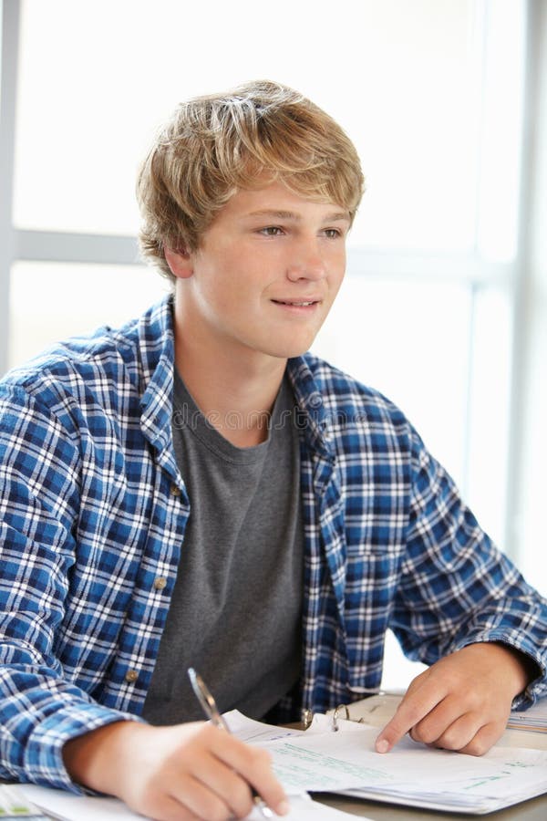 Teenage boy in class stock photo. Image of academic, college - 55892784