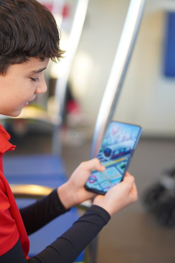 Teenage Boy Commuters. Boy Traveling by Subway or Train and Using a Map ...
