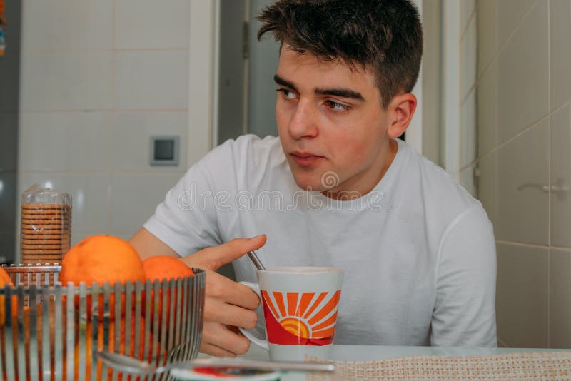 Teenage Boy Having Breakfast Stock Photo - Image of lifestyle, portrait ...