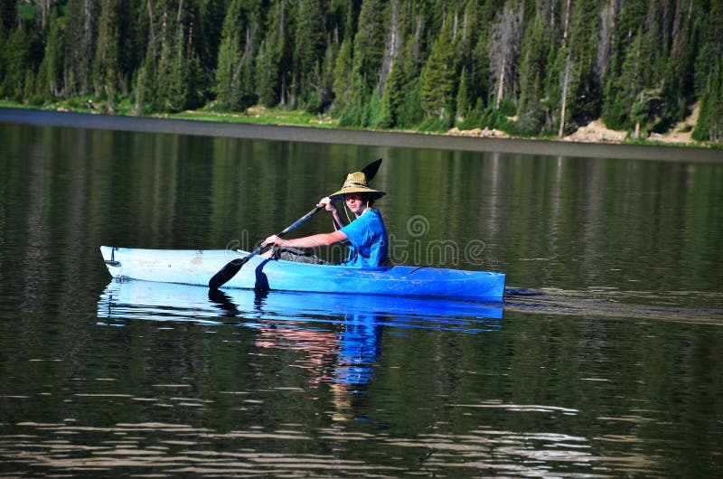 Teenage Boy Kayaking stock image. Image of forest, canoe - 20822467