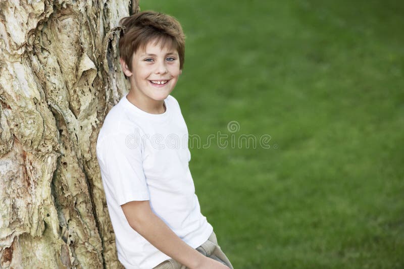 Teenage Boy Leaning Tree Trunk Stock Photos - Free & Royalty-Free Stock ...