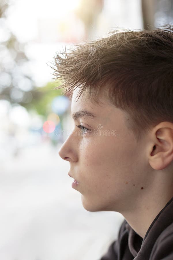 Teenage boy in profile stock photo. Image of casual, teen - 61642082