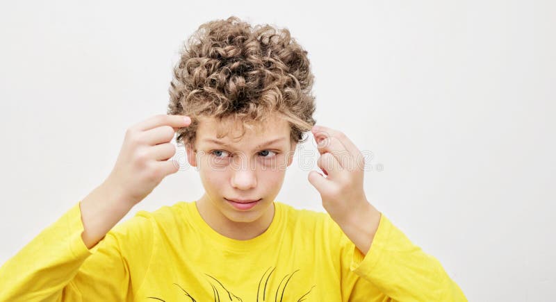 Teenage Boy Squeezes Acne while Looking at Phone. the Problem of ...