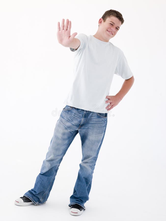 Teenage Boy Standing with Hand Up Stock Photo - Image of male ...