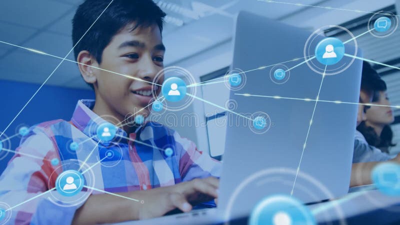Teenage Boy Typing on Laptop in Computer Lab, Showing Education ...