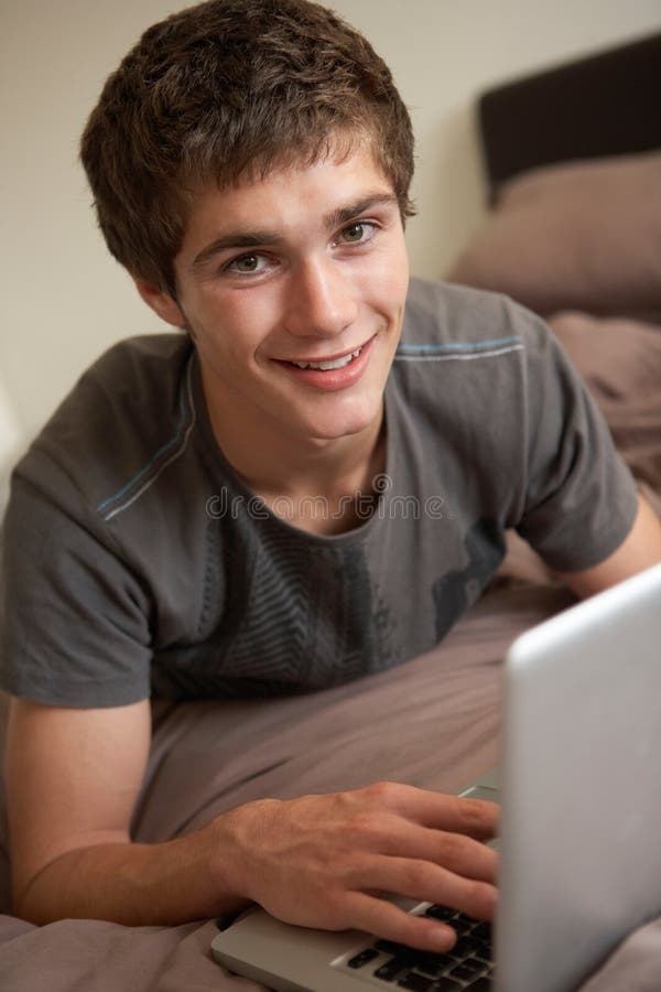 Teenage Boy Using Laptop at Home Stock Photo - Image of inside ...