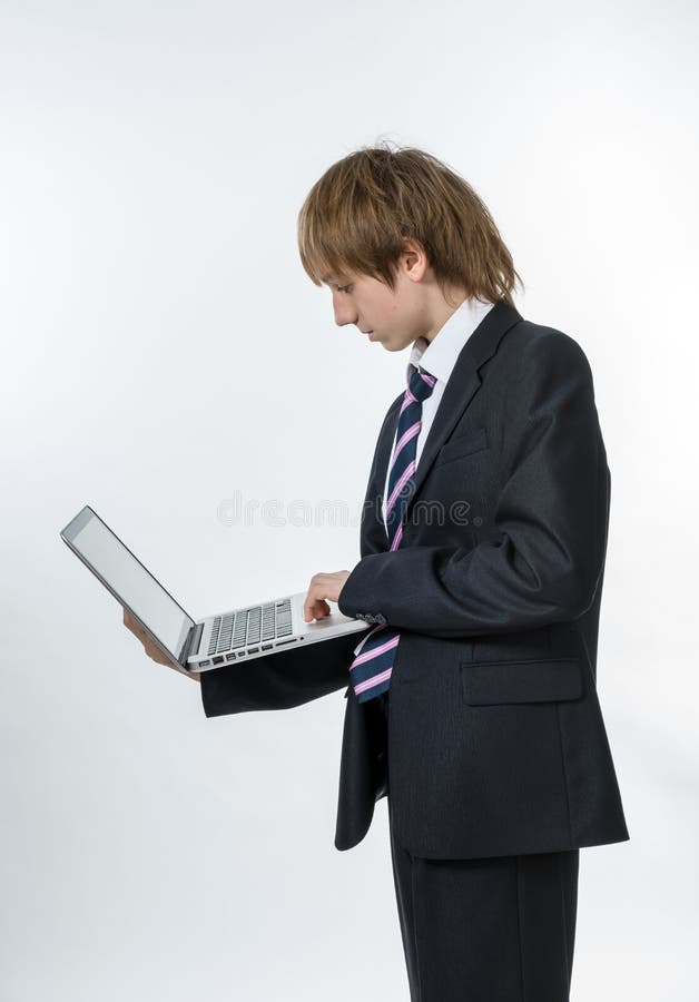 Teenage Boy Working in White Laptop Stock Image - Image of computer ...