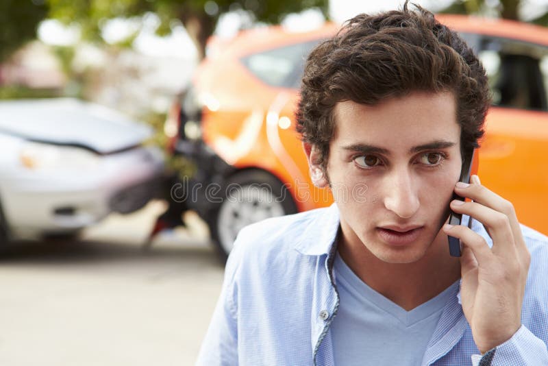 Teenage Driver Making Phone Call after Traffic Accident Stock Photo ...