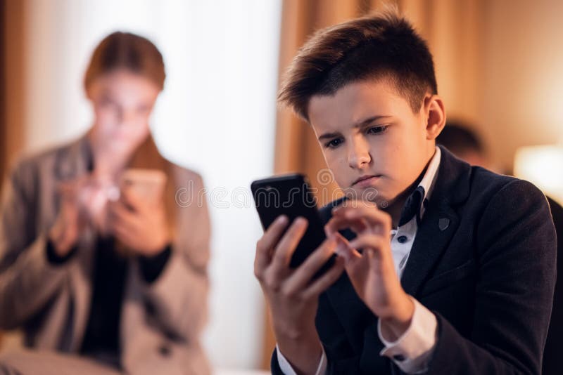 Teenage Family Using Gadgets. Modern Technology Concept Stock Image ...