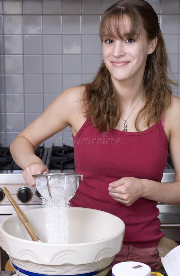 Teenage girl baking stock image. Image of happy, baking - 6834635