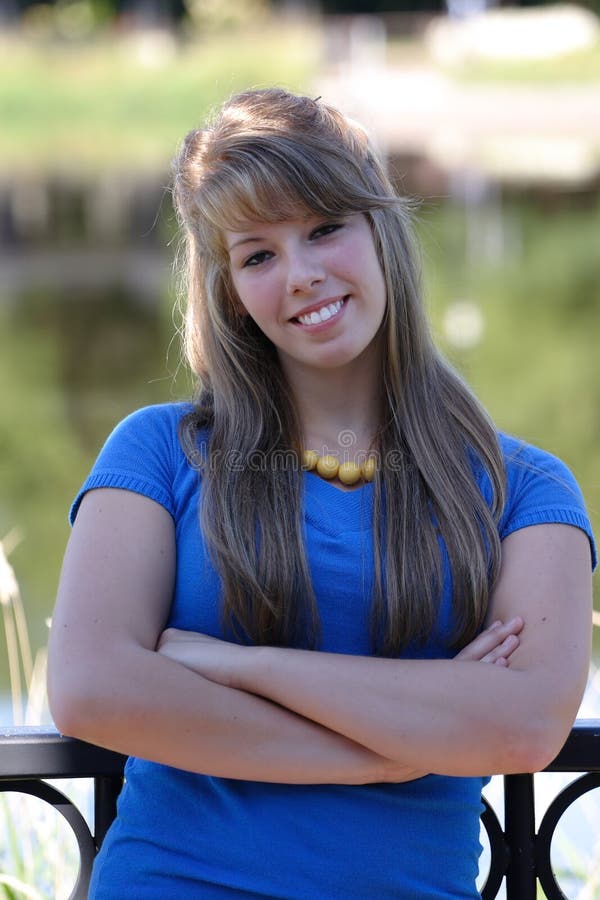 Teenage Girl in Blue stock image. Image of blond, railing - 3546143