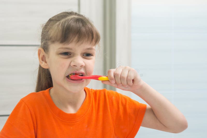 Teenage Girl Cleans Her Front Teeth Stock Image - Image of fair ...
