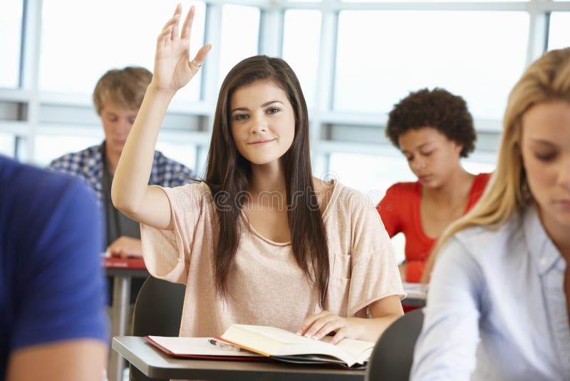 Teenage Girl with Hand Up in Class Stock Image - Image of girls ...