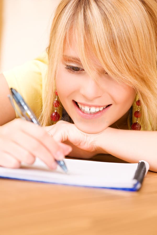 Teenage Girl with Notebook and Pen Stock Photo - Image of caucasian ...