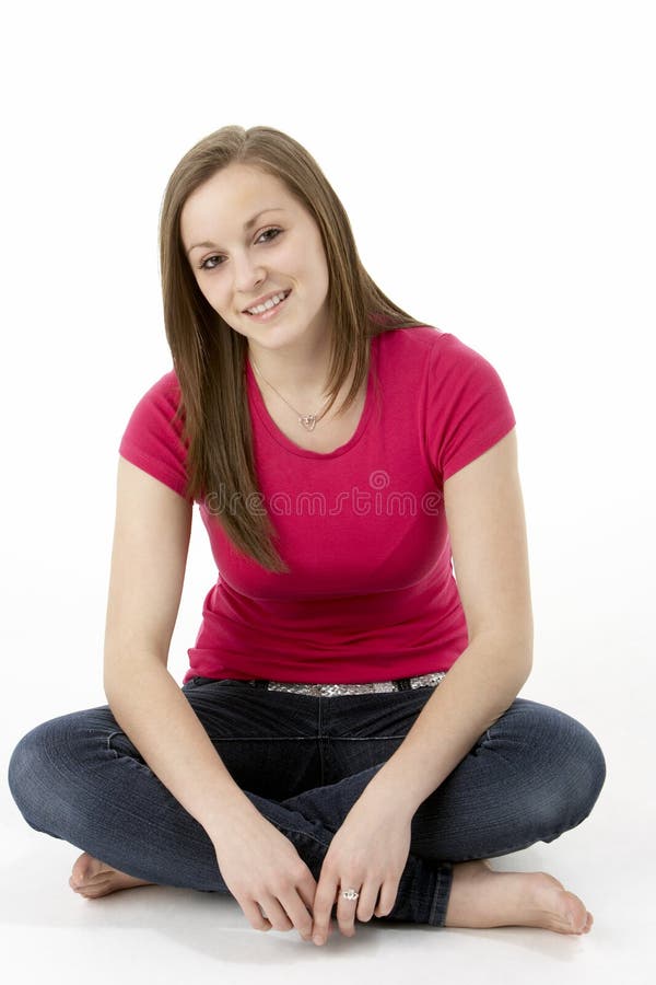 Studio Portrait of Teenage Girl Sitting in Chair Stock Image - Image of ...