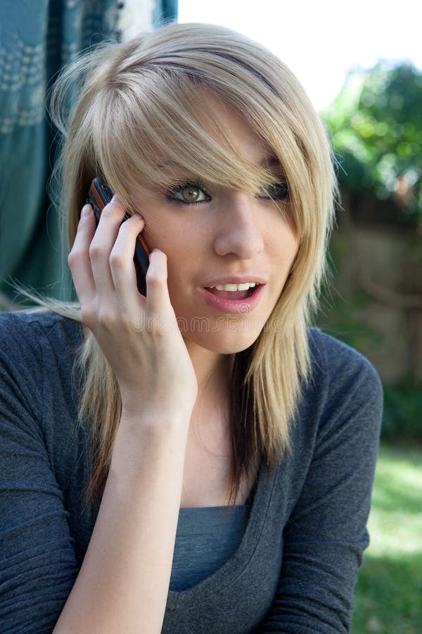 Teenage Girl Talking on Mobile Cell Phone Stock Photo - Image of ... Teenage Girl Talking on Mobile Cell Phone Stock Photo - Image of ...