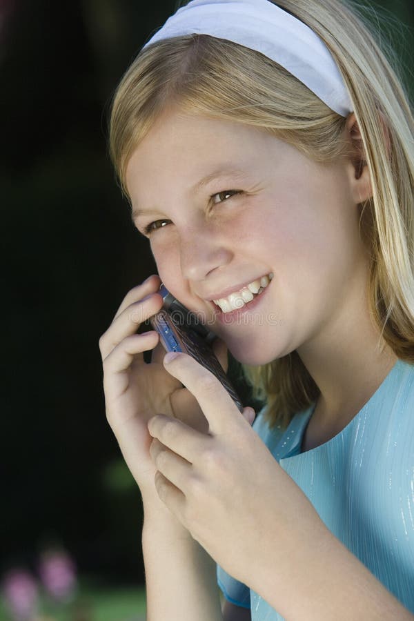 Teenage Girl Using Cell Phone Stock Photo - Image of girl, smiling ...