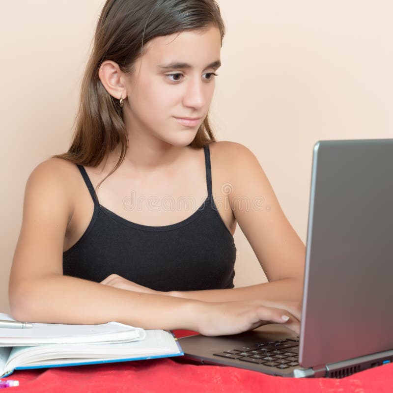 Teenage Girl Working on Her Computer at Home Stock Photo - Image of ...